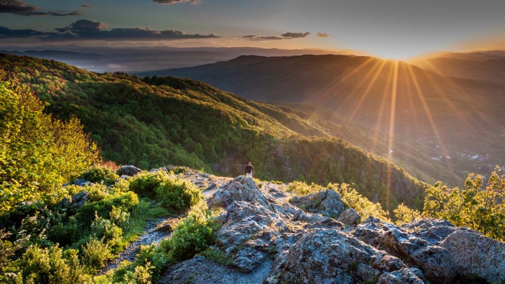 Sunset through stormy clouds over Vitosha mountain in Sofia, Bulgaria ...